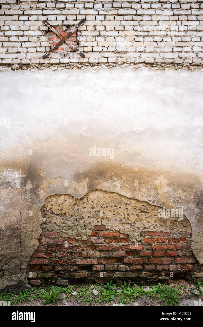 Old weathered wall of bricks and a ground Stock Photo - Alamy
