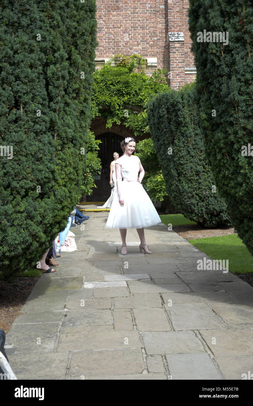 Beautiful Models wearing Bridal wear are walking on a catwalk at ...