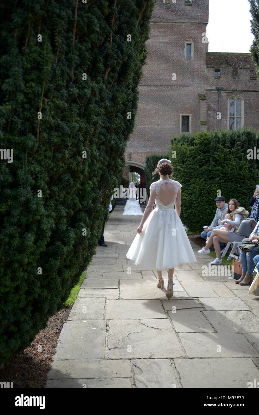 Beautiful Models wearing Bridal wear are walking on a catwalk at ...