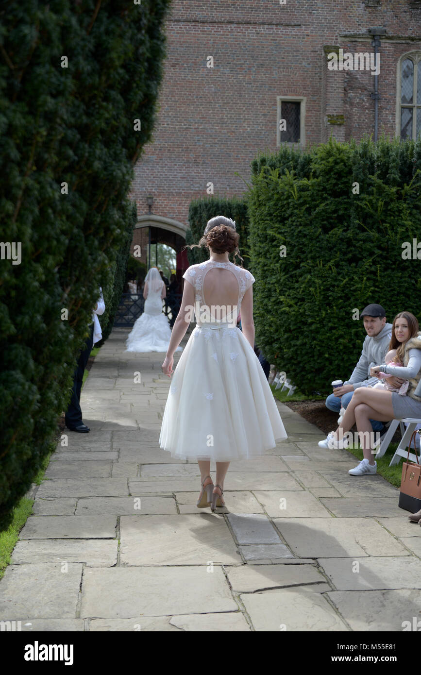 Beautiful Models wearing Bridal wear are walking on a catwalk at ...