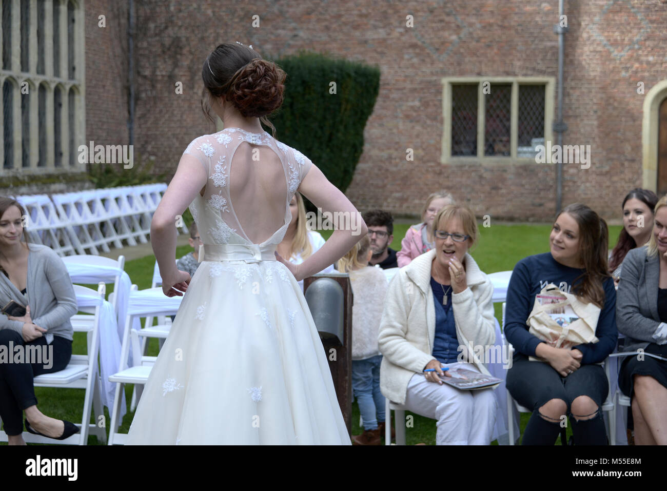 Beautiful Models wearing Bridal wear are walking on a catwalk at ...