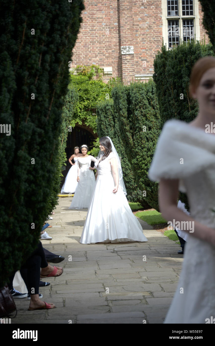 Beautiful Models wearing Bridal wear are walking on a catwalk at ...