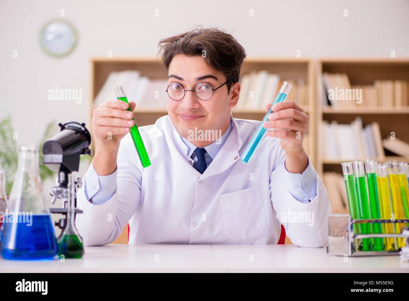 Mad crazy scientist doctor doing experiments in a laboratory Stock ...