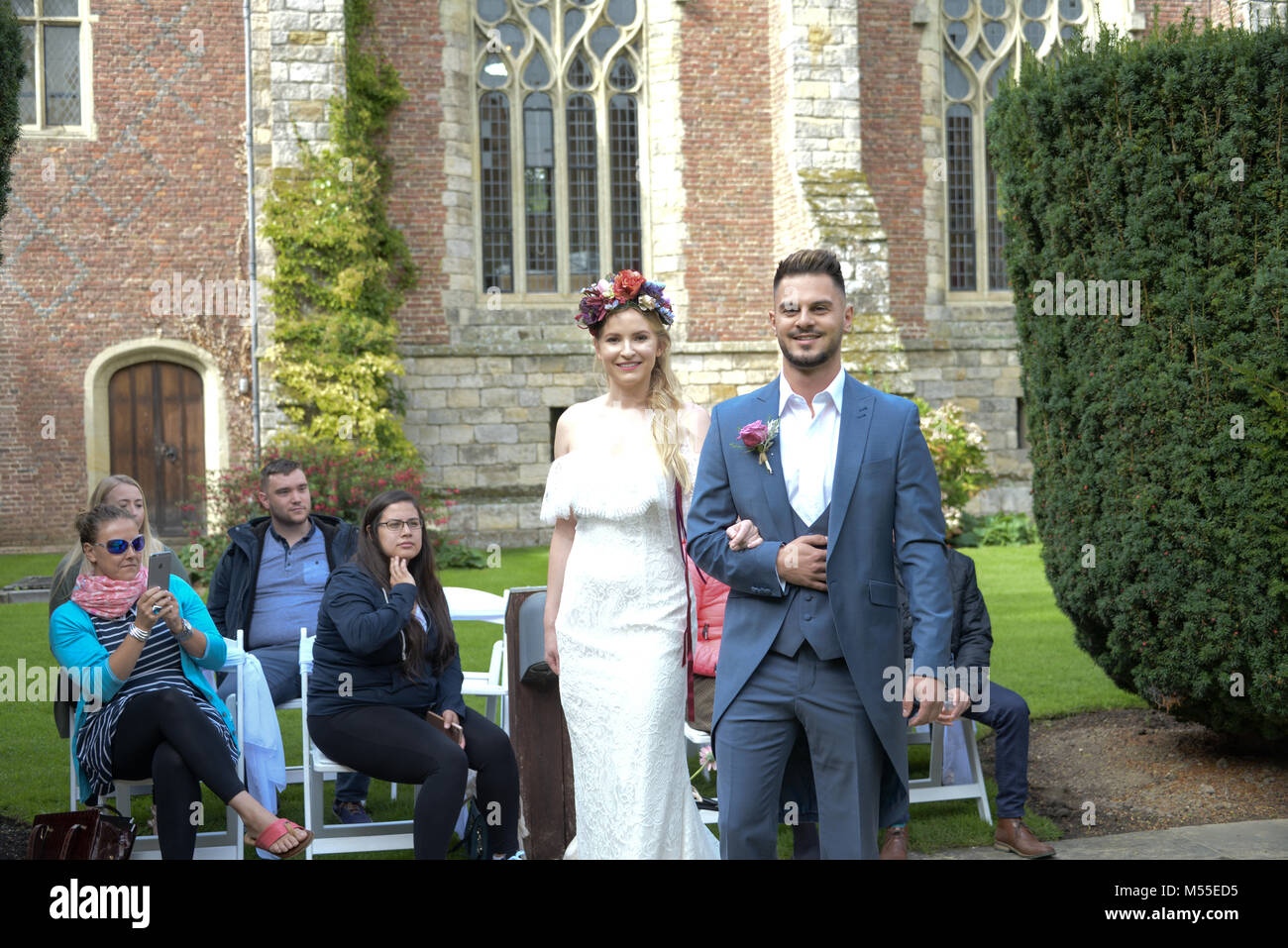 Beautiful Models wearing Bridal wear are walking on a catwalk at ...