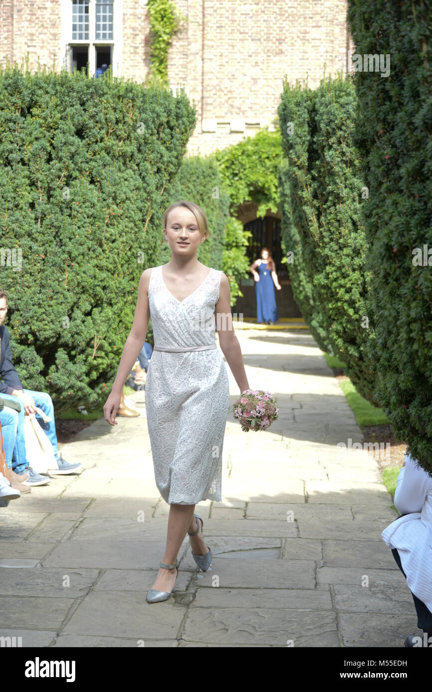 Beautiful Models wearing Bridal wear are walking on a catwalk at ...