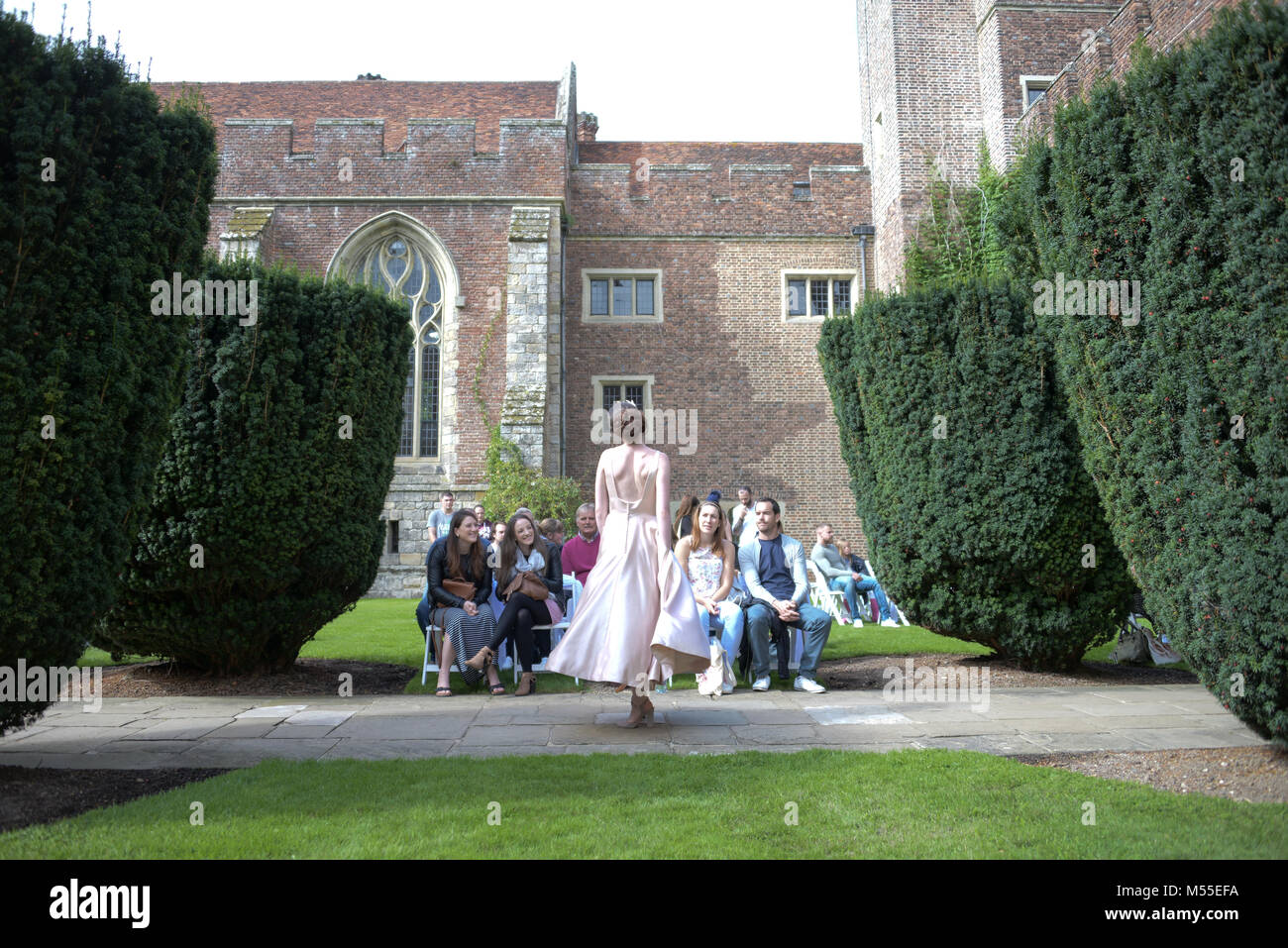 Beautiful Models wearing Bridal wear are walking on a catwalk at ...