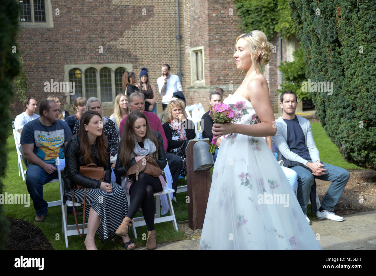 Beautiful Models wearing Bridal wear are walking on a catwalk at ...