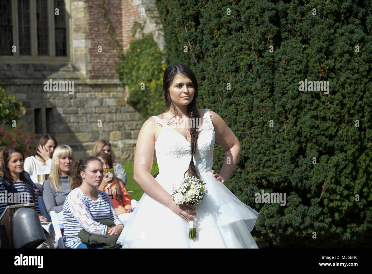 Beautiful Models wearing Bridal wear are walking on a catwalk at ...
