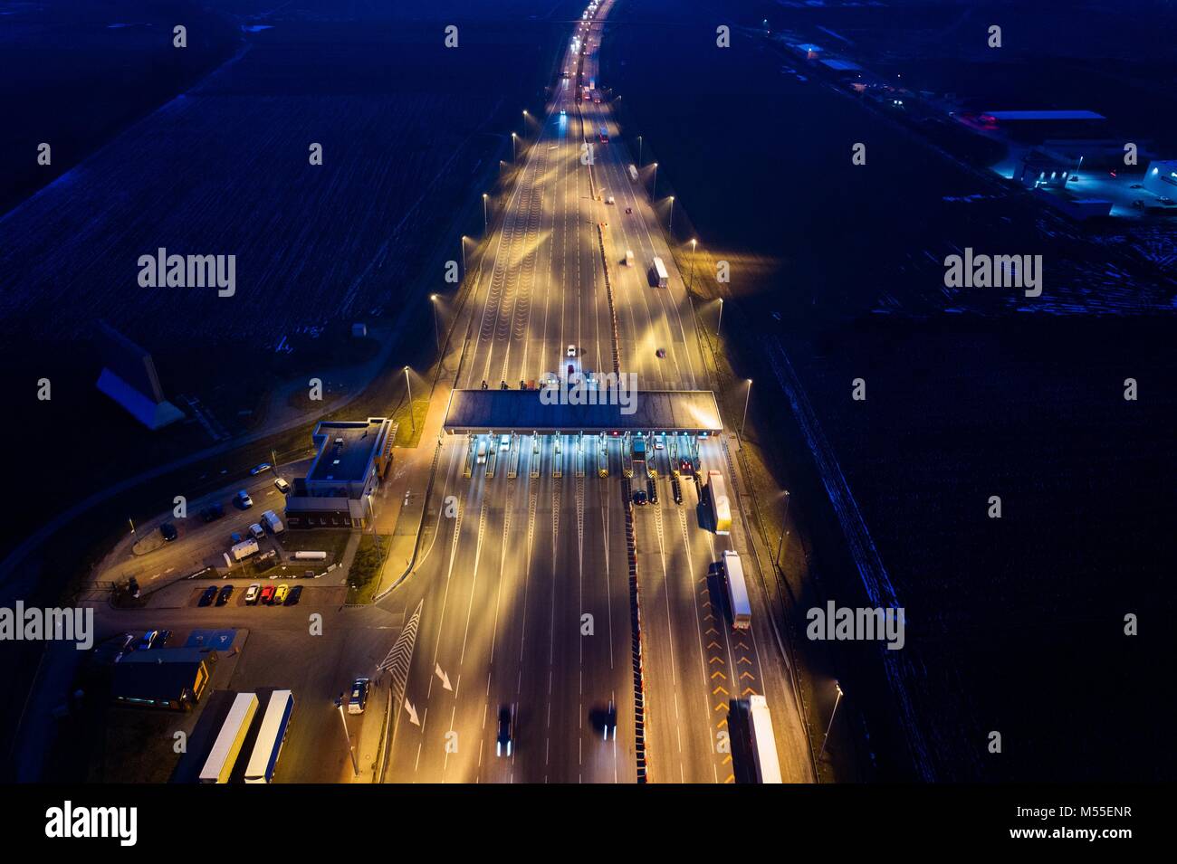 Aerial drone view on motorway with toll collection point at night Stock ...