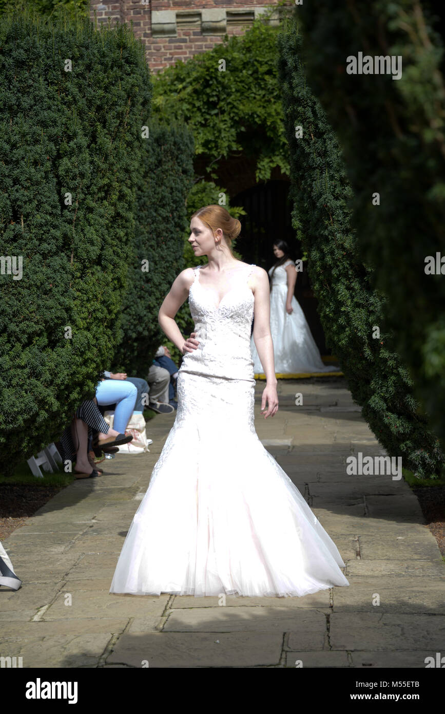 Beautiful Models wearing Bridal wear are walking on a catwalk at ...