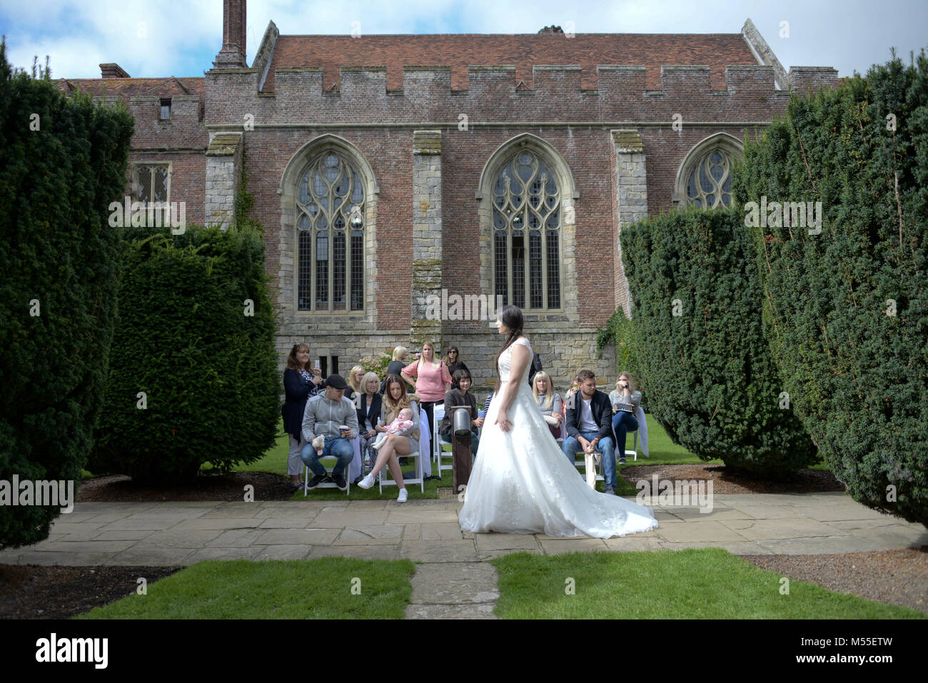 Beautiful Models wearing Bridal wear are walking on a catwalk at ...
