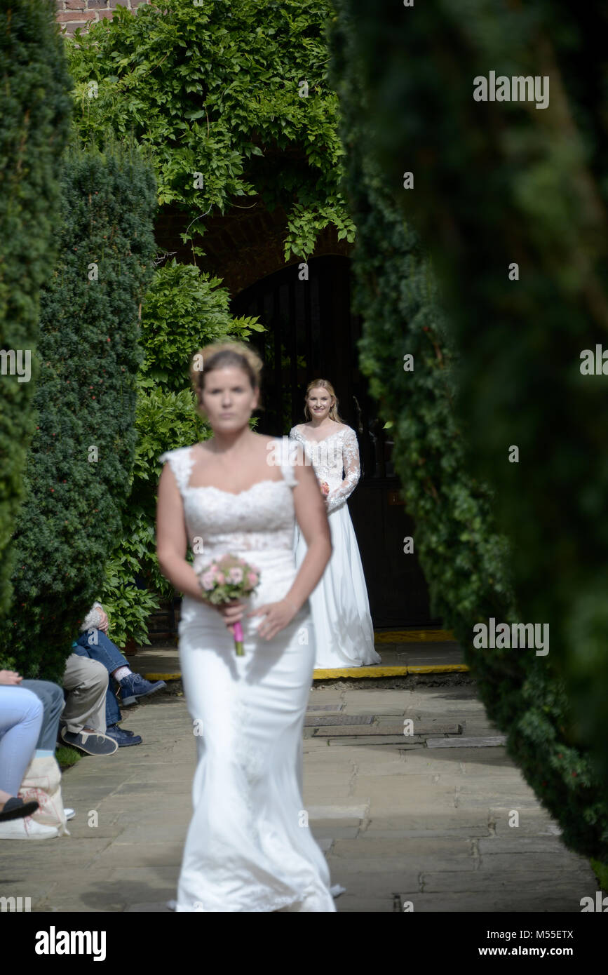 Beautiful Models wearing Bridal wear are walking on a catwalk at ...