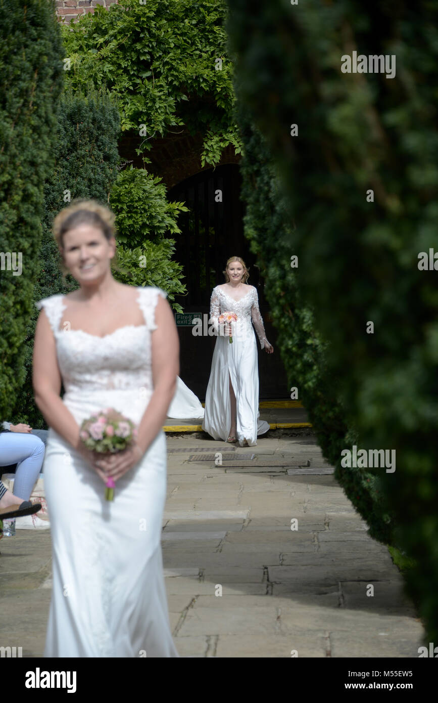 Beautiful Models wearing Bridal wear are walking on a catwalk at ...
