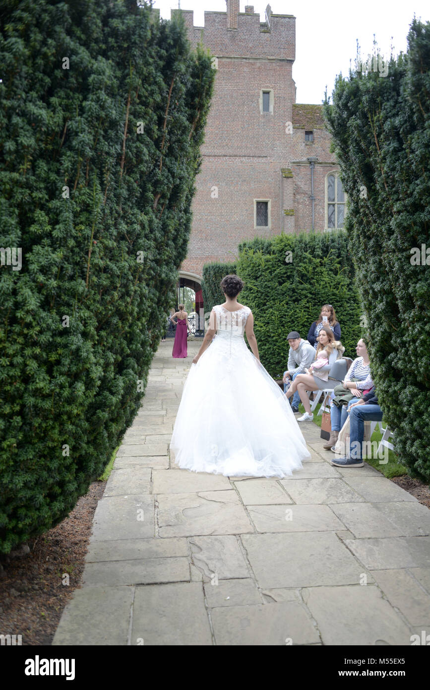 Beautiful Models wearing Bridal wear are walking on a catwalk at ...