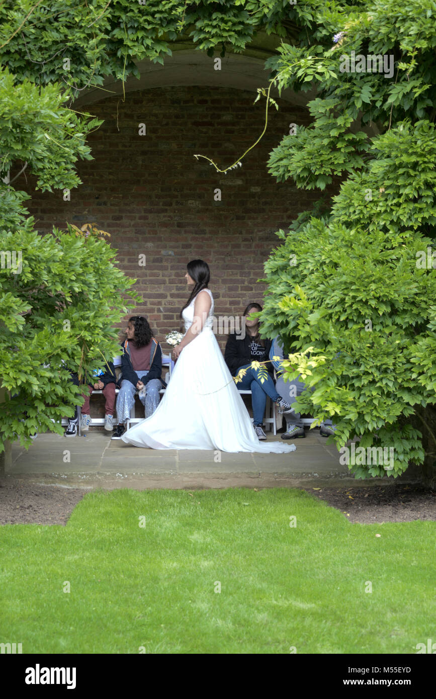 Beautiful Models wearing Bridal wear are walking on a catwalk at ...
