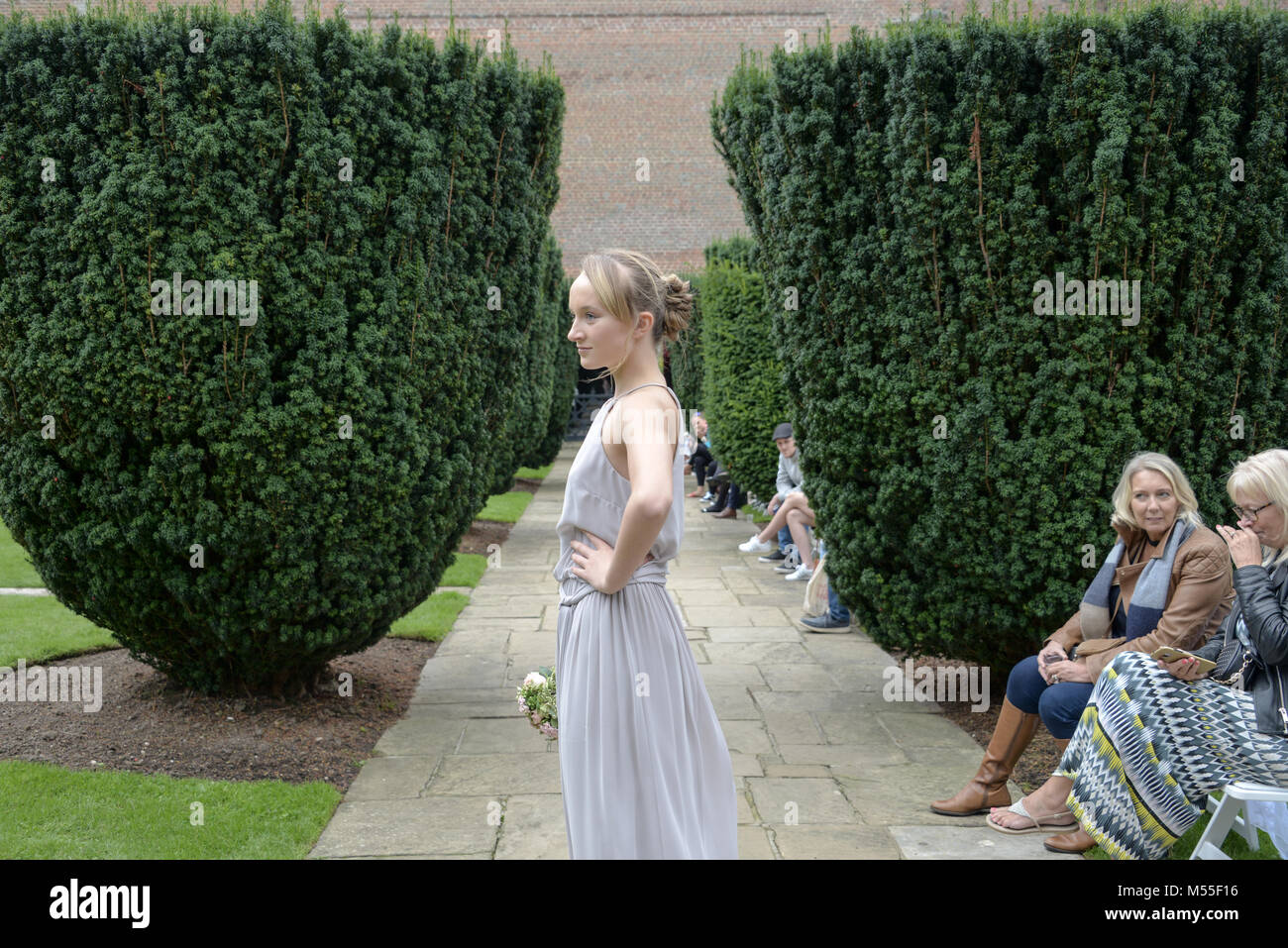 Beautiful Models wearing Bridal wear are walking on a catwalk at ...