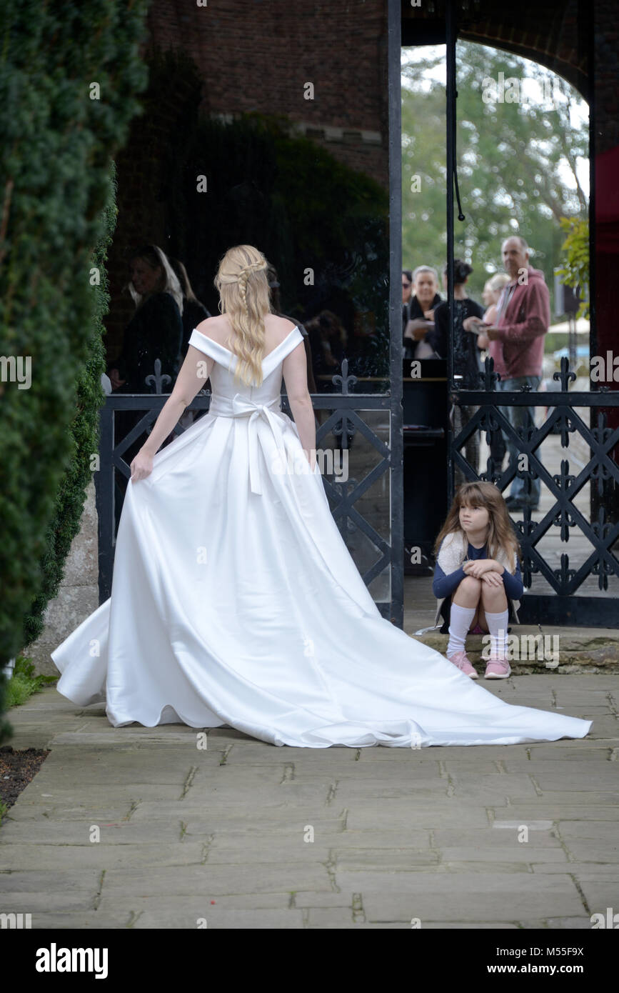 Beautiful Models wearing Bridal wear are walking on a catwalk at ...