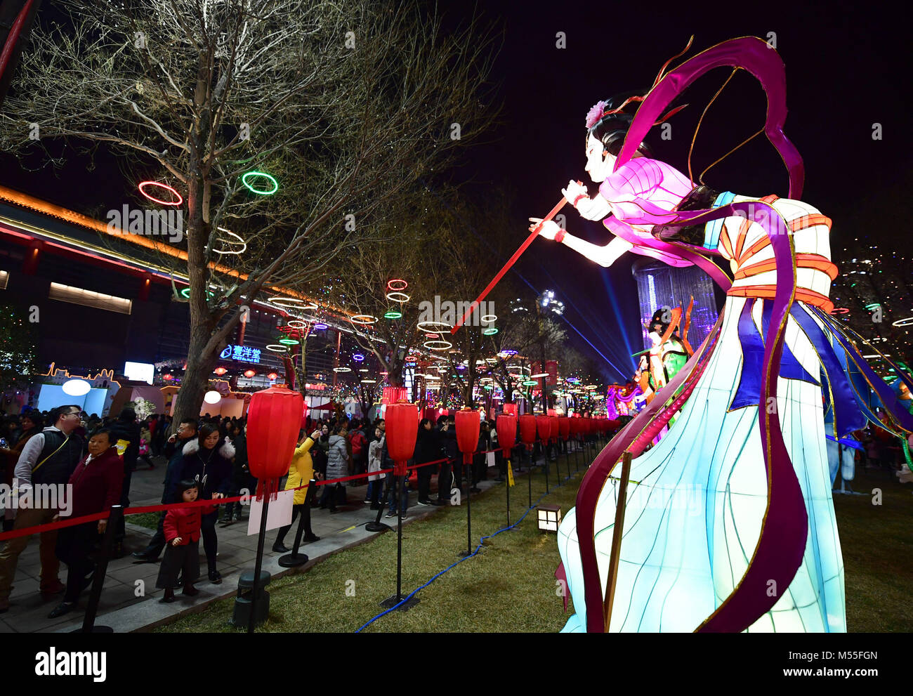 Xi'an, China's Shaanxi Province. 19th Feb, 2018. People watch colorful ...