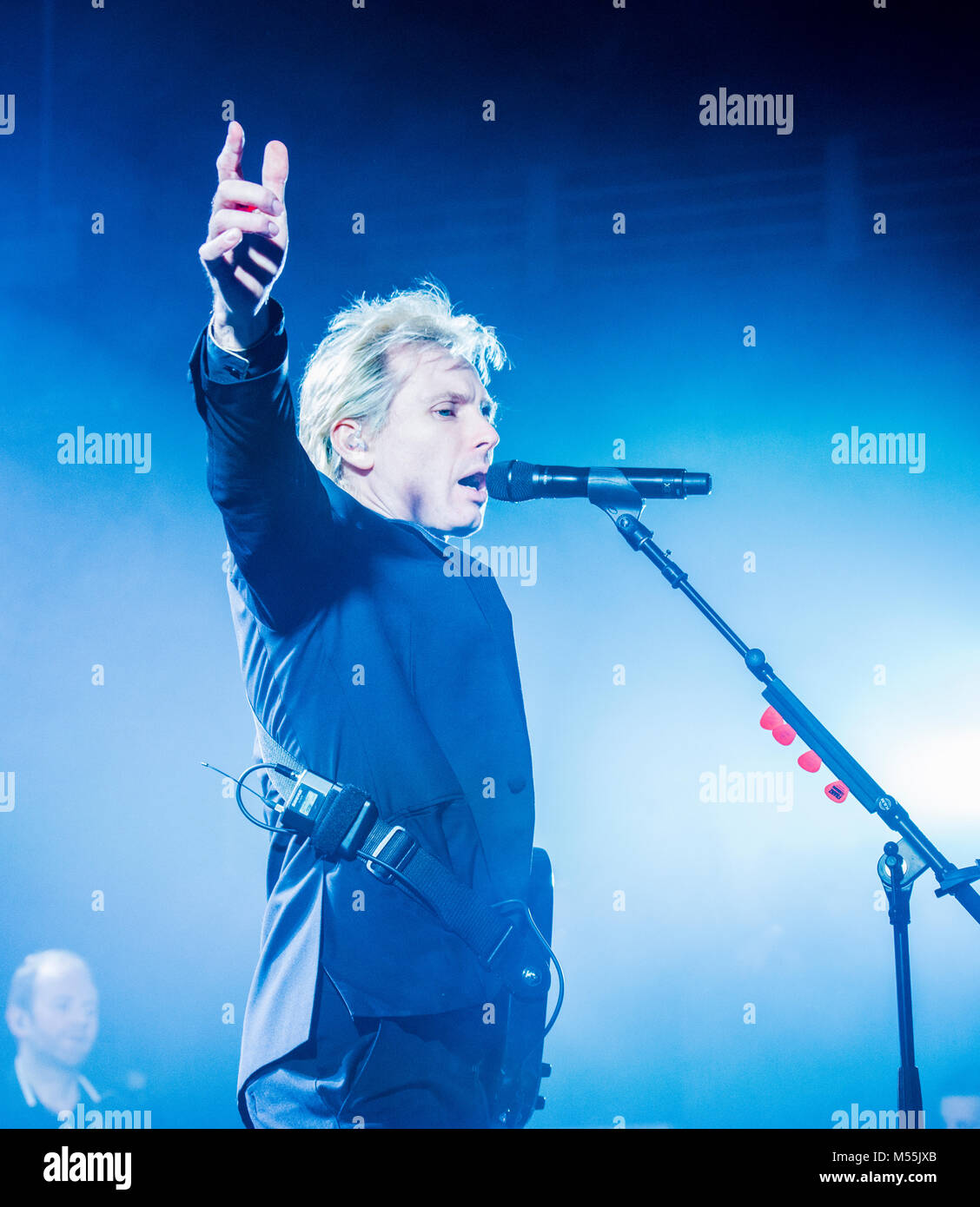 Alex Kapranos (lead singer of the band Franz Ferdinand) performing live ...