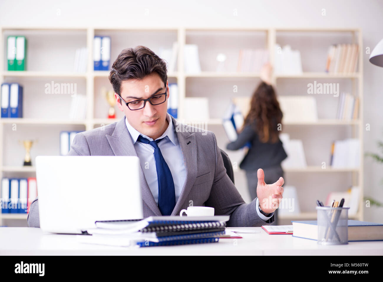 Angry boss unhappy with female employee performance Stock Photo - Alamy