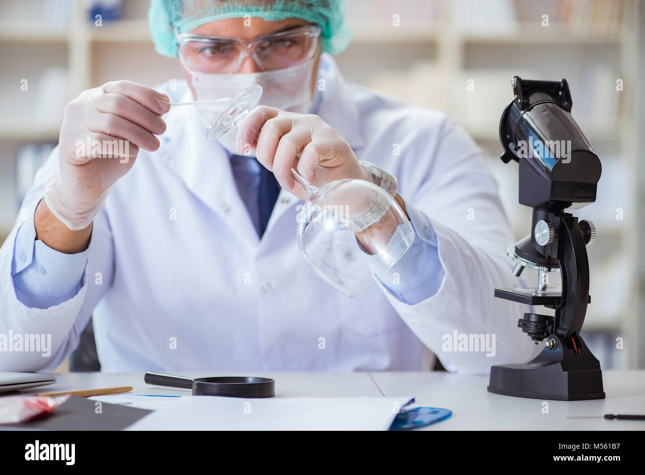 Forensic scientist analysing dna hi-res stock photography and images ...