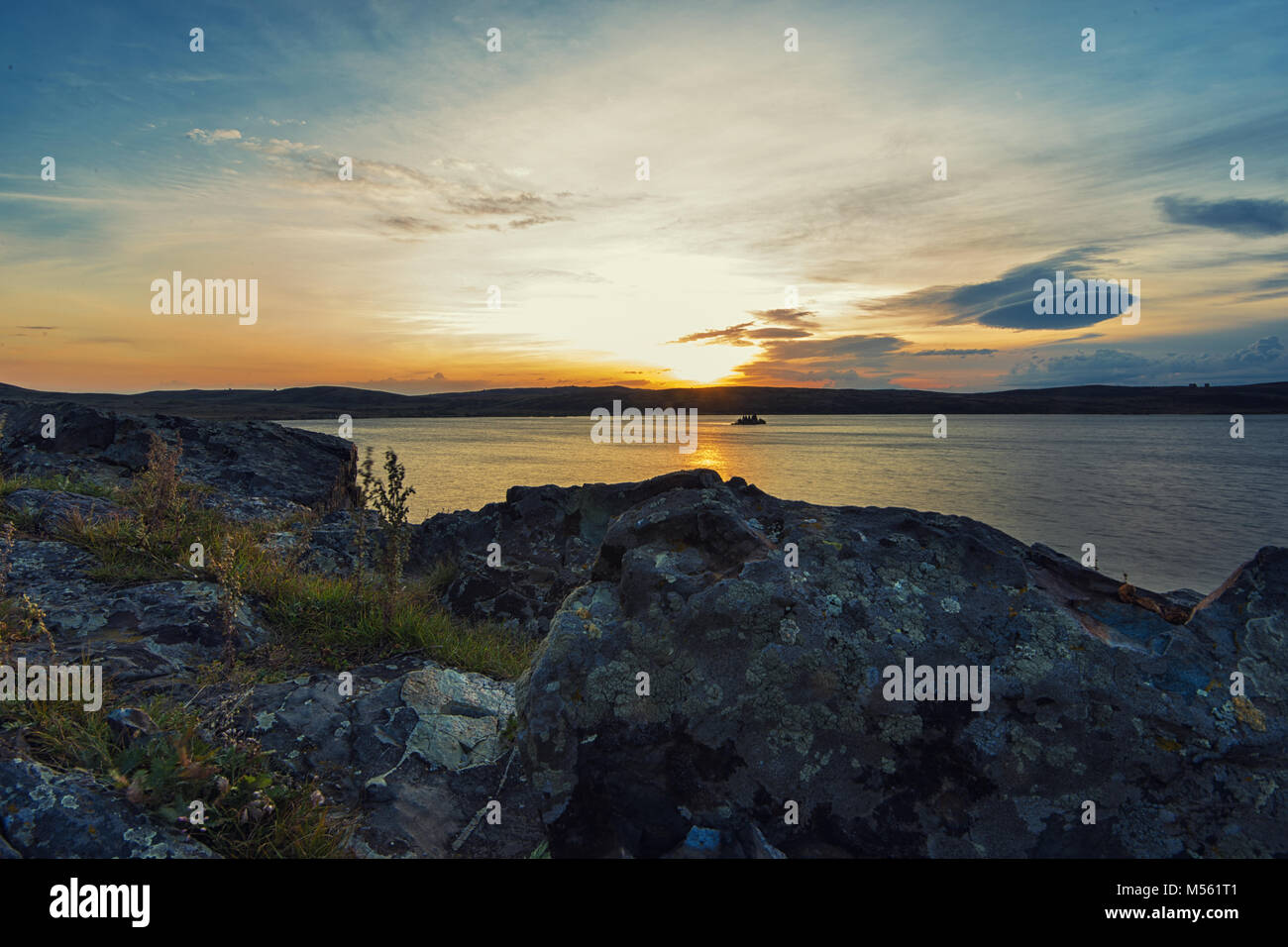 Sundawn at lake Stock Photo - Alamy