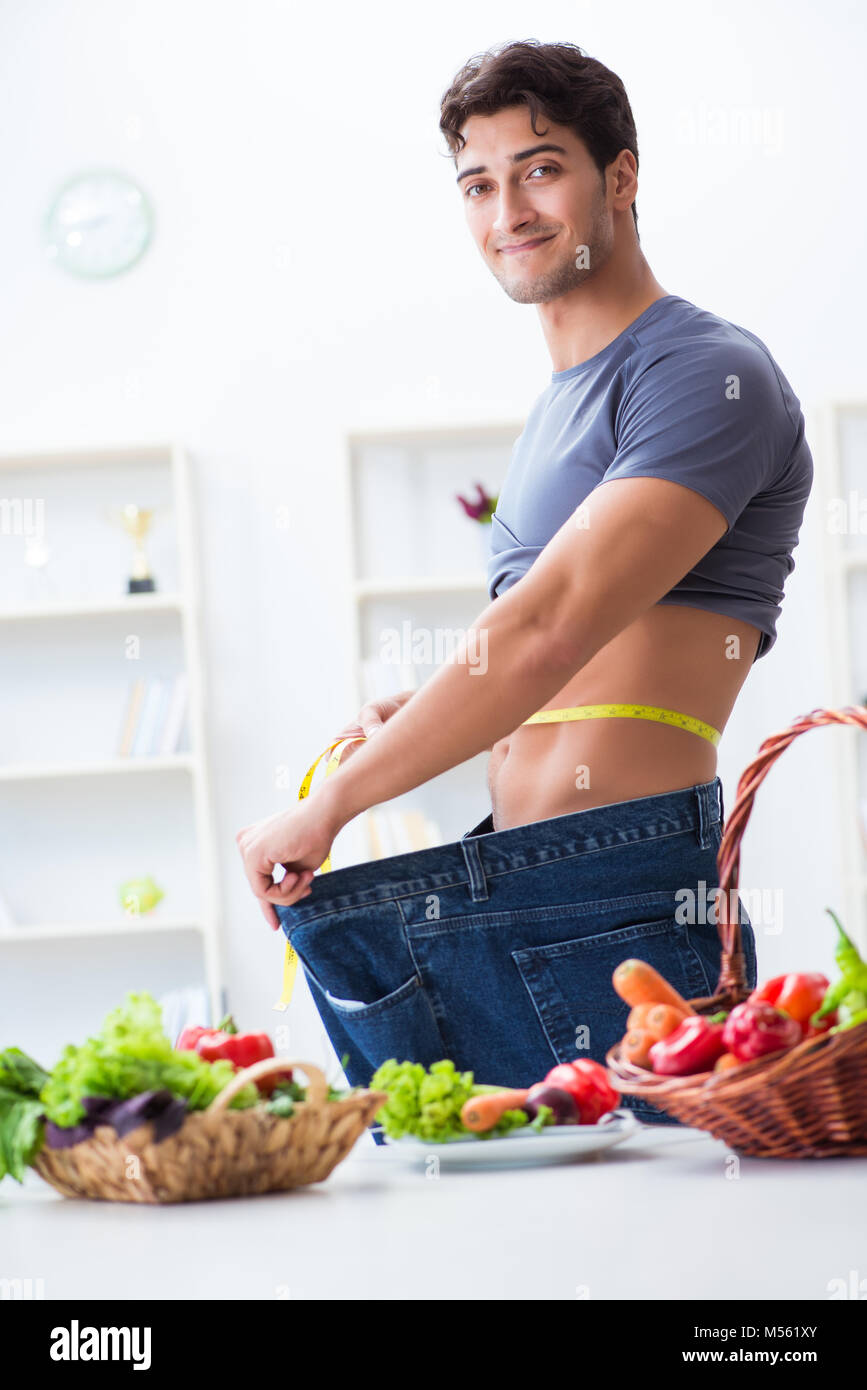 Young man in healthy eating and dieting concept Stock Photo - Alamy