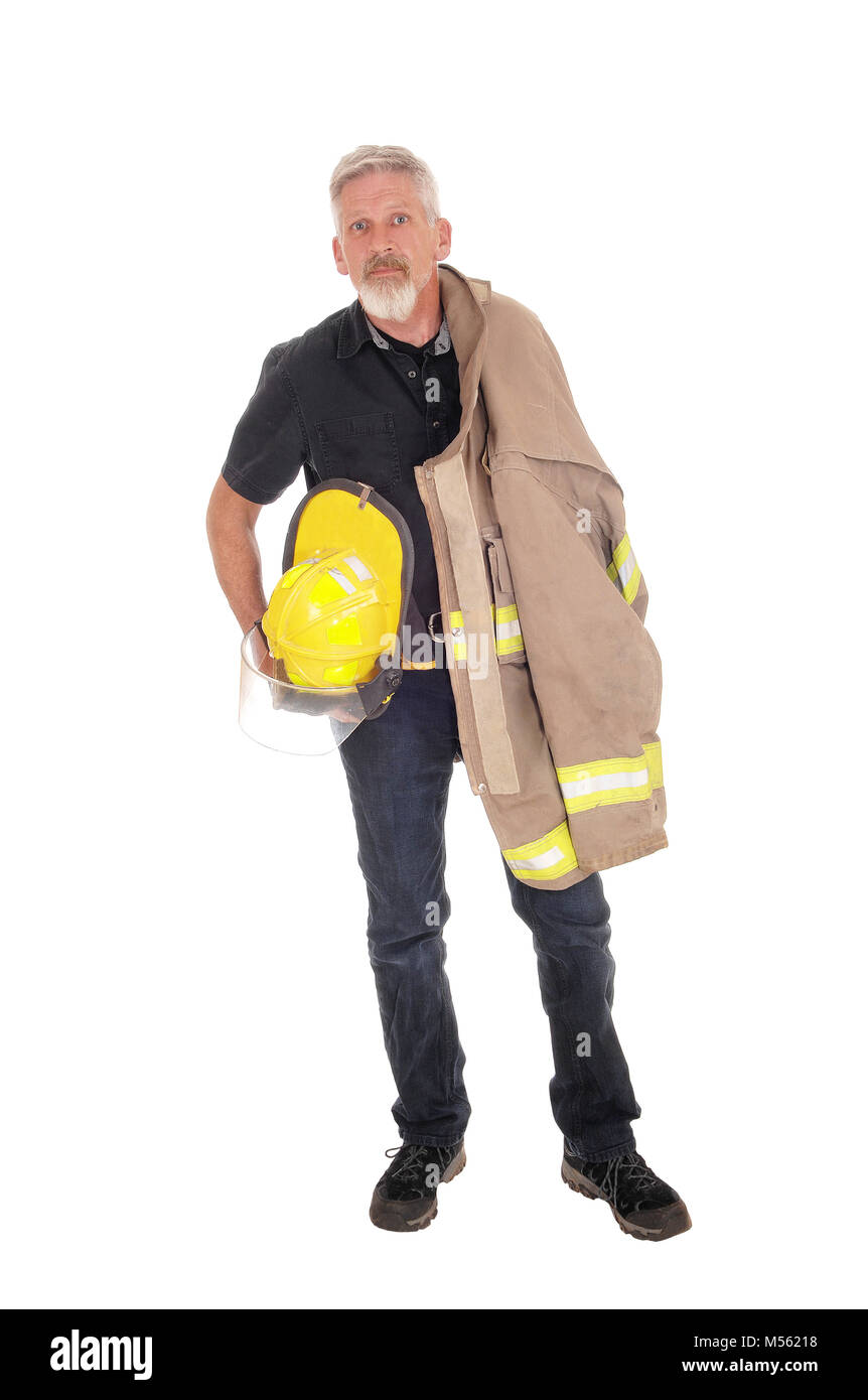 A firefighter with jacket standing from front Stock Photo - Alamy