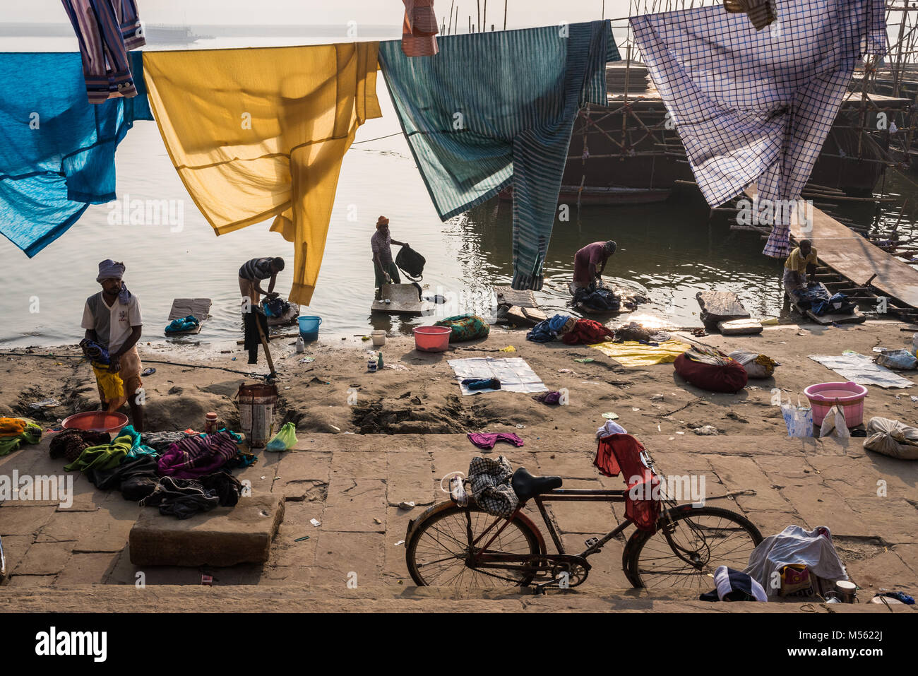 Indian man washing clothes on hi-res stock photography and images - Alamy