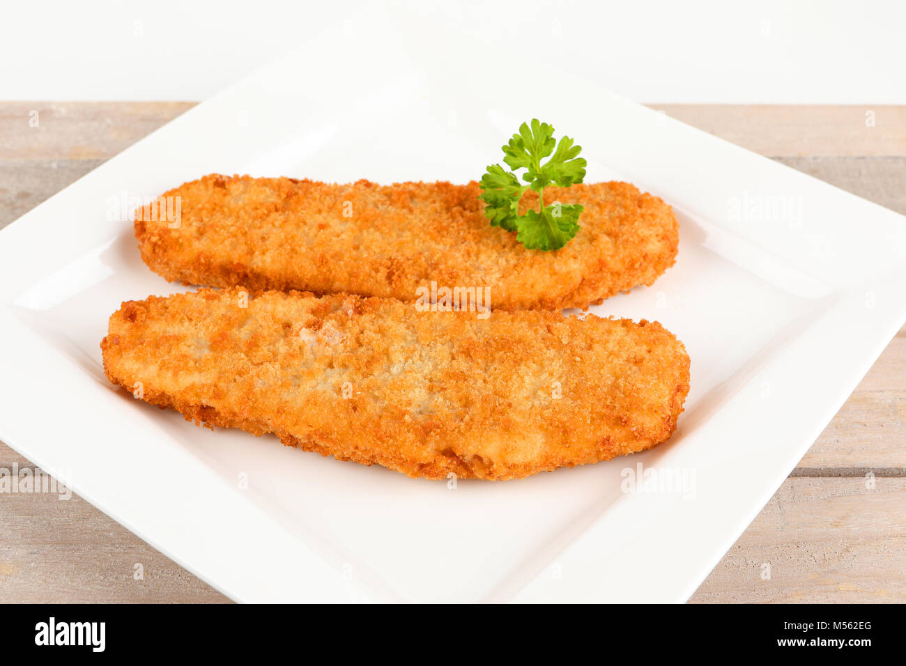 fried fish on a plate Stock Photo - Alamy