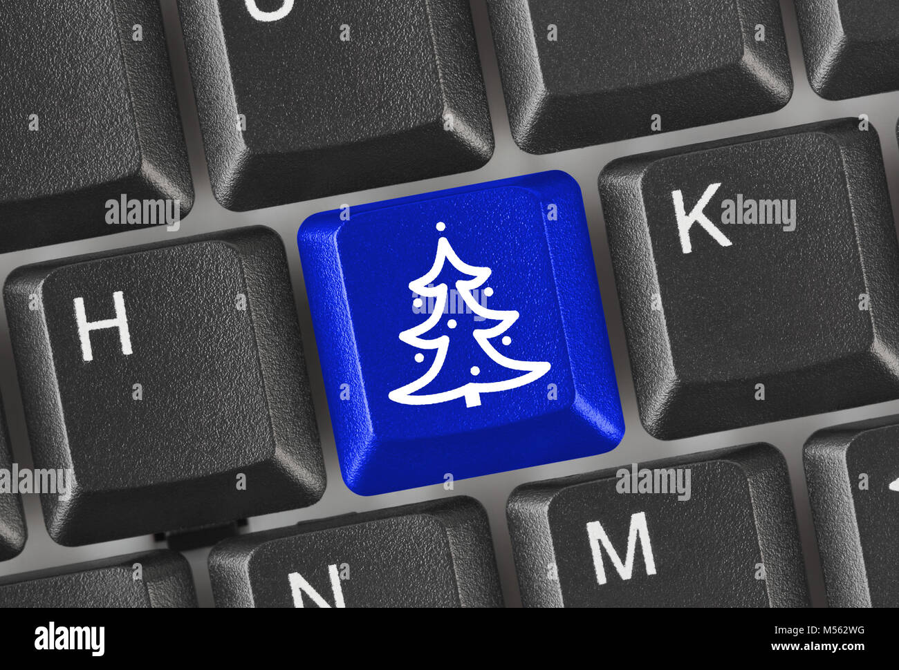 Computer keyboard with Christmas tree key Stock Photo - Alamy