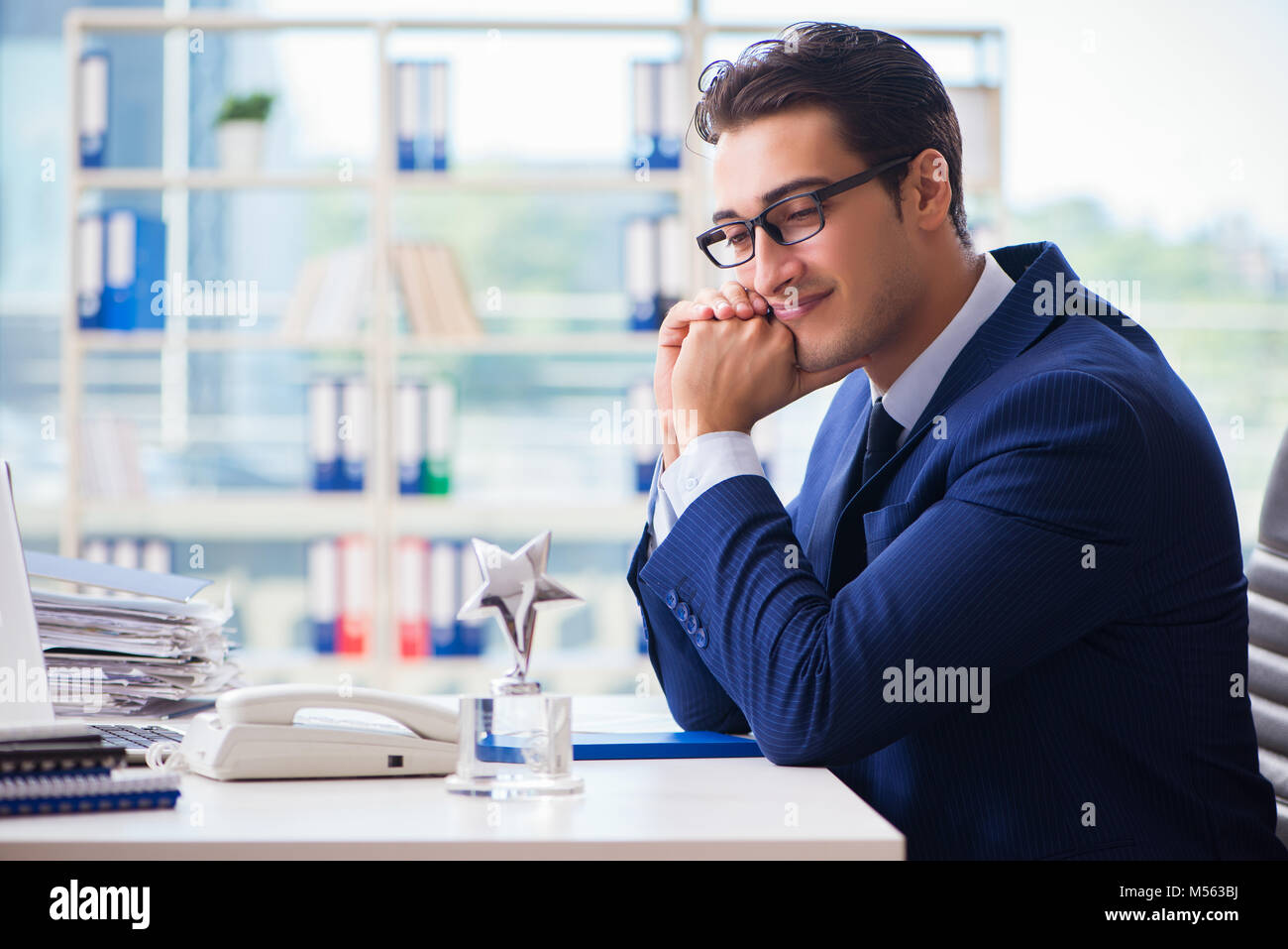 Businessman winning best employee of the month award Stock Photo - Alamy
