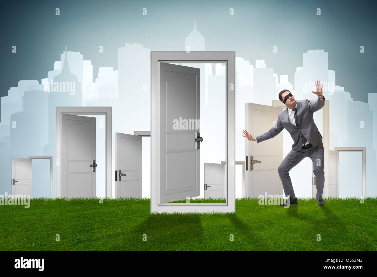 Confused businessman in front of doors Stock Photo - Alamy