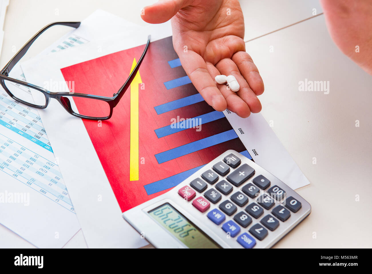 Finance analyst feeling sick due to bad results Stock Photo - Alamy