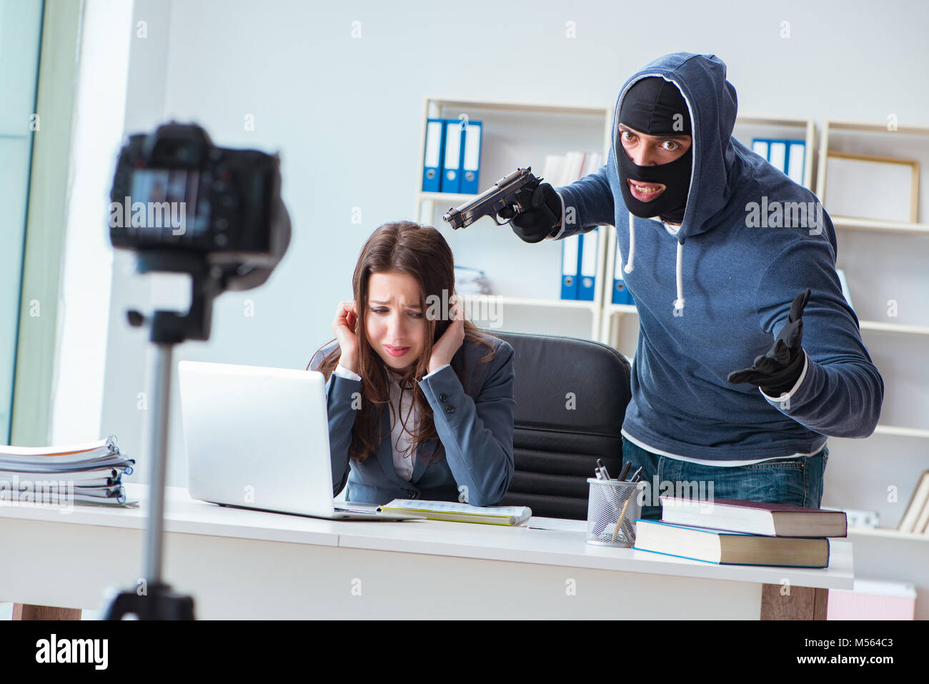 Criminal recording message for ransom with victim businesswoman Stock ...