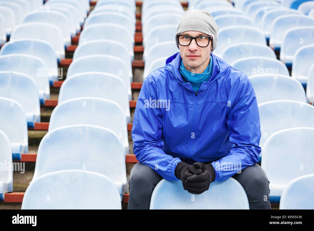 Professional adult coach sitting on hi-res stock photography and images ...