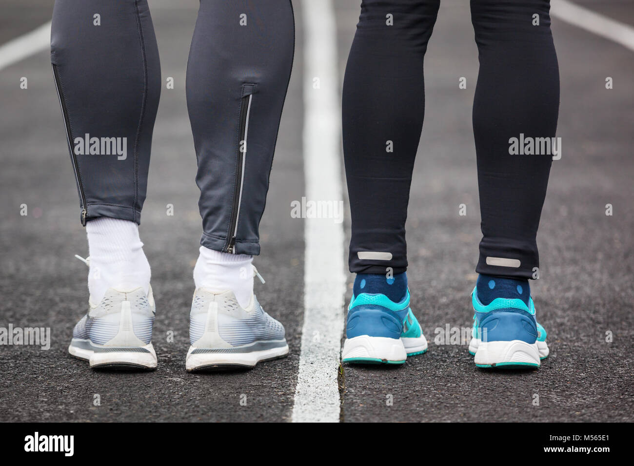 Woman legs standing from behind hi-res stock photography and images - Alamy