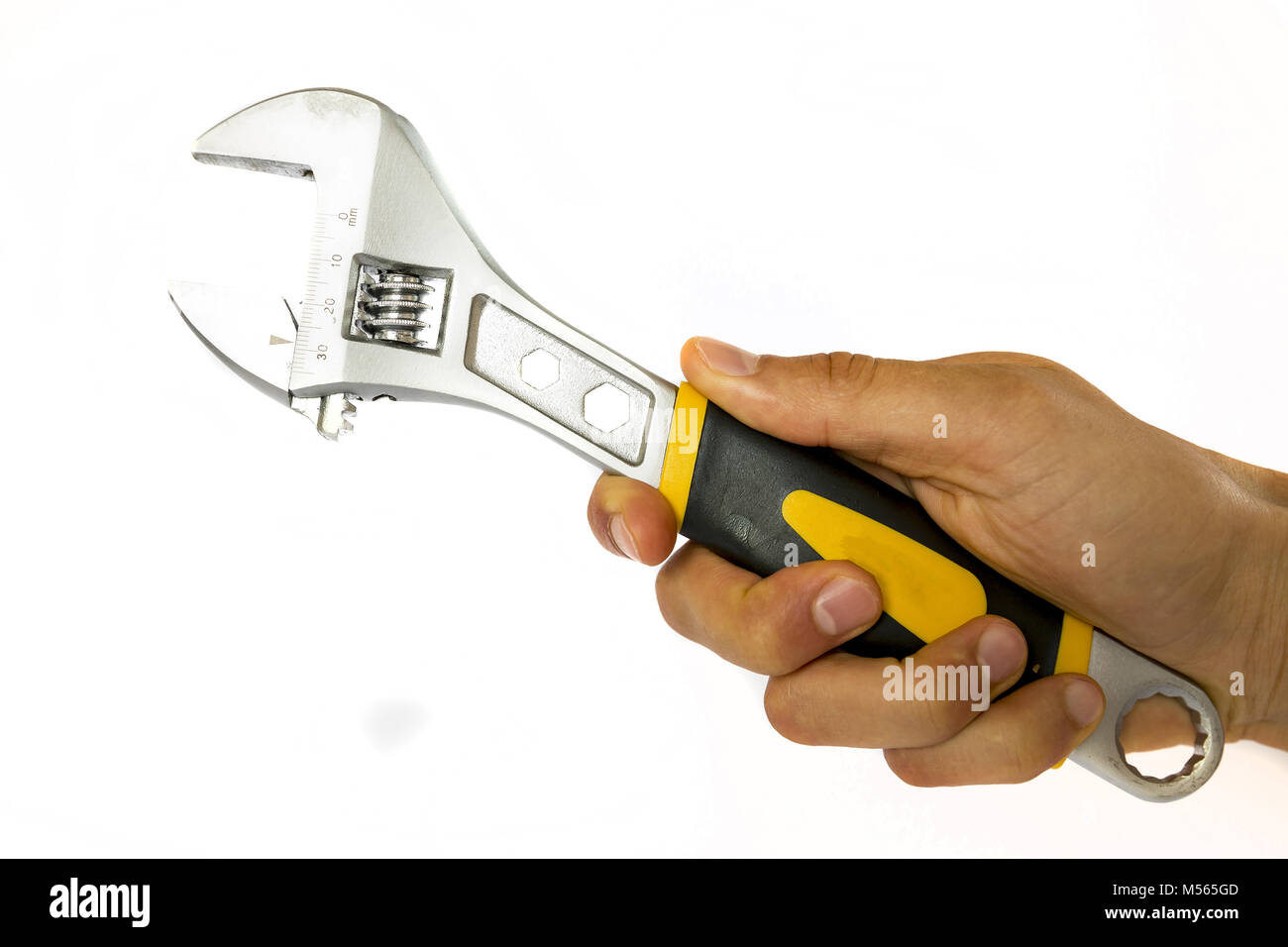 Adjustable Wrench in human hand Stock Photo - Alamy