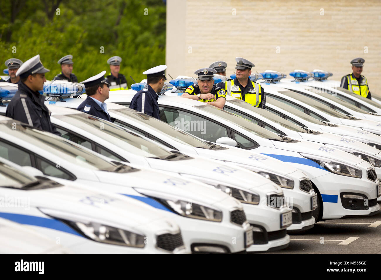 Police officers stand beside hi-res stock photography and images - Alamy