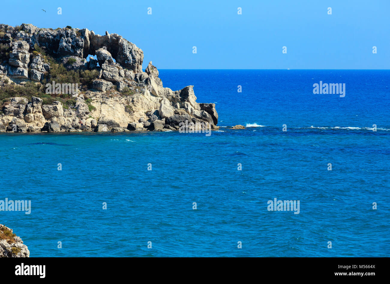 Rock in sea near Agrigento, Sicily, Italy Stock Photo - Alamy