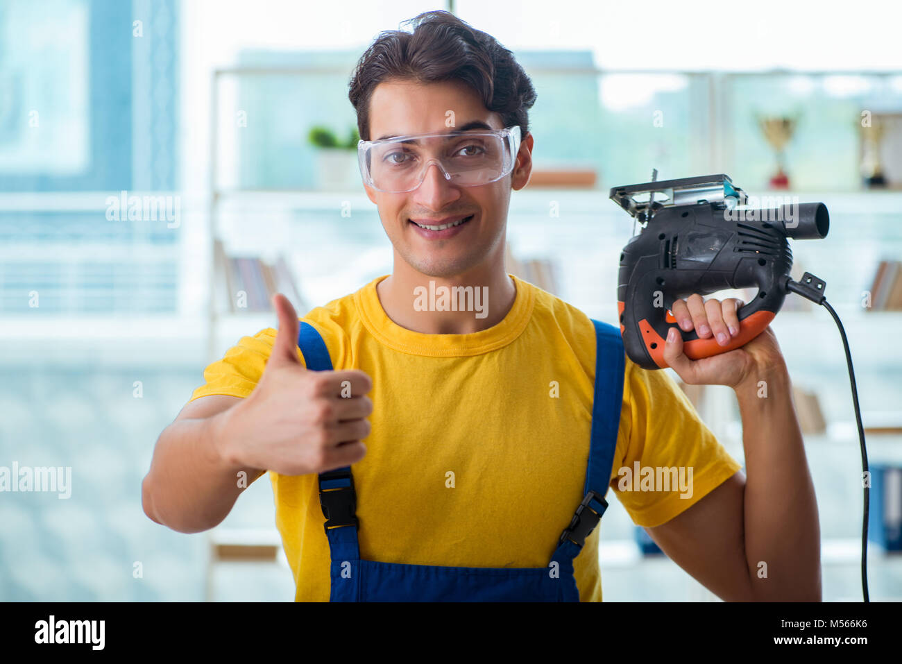 Furniture carpenter working in the workshop Stock Photo - Alamy