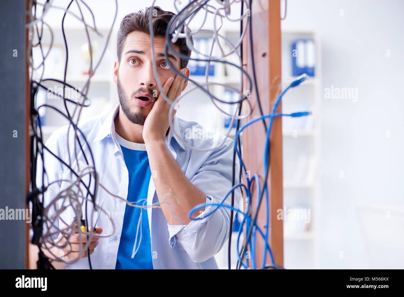 Engineer connecting network cable switch hi-res stock photography and ...