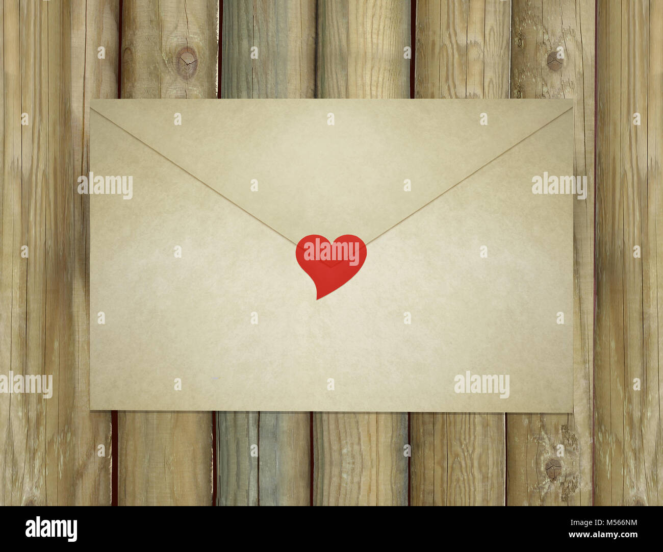 A love letter envelope enclosed by a red heart Stock Photo - Alamy