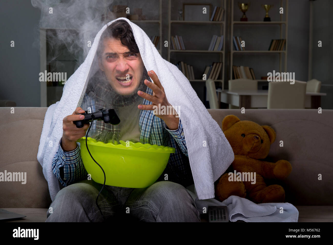 Sick man doing inhalation at night in home Stock Photo - Alamy