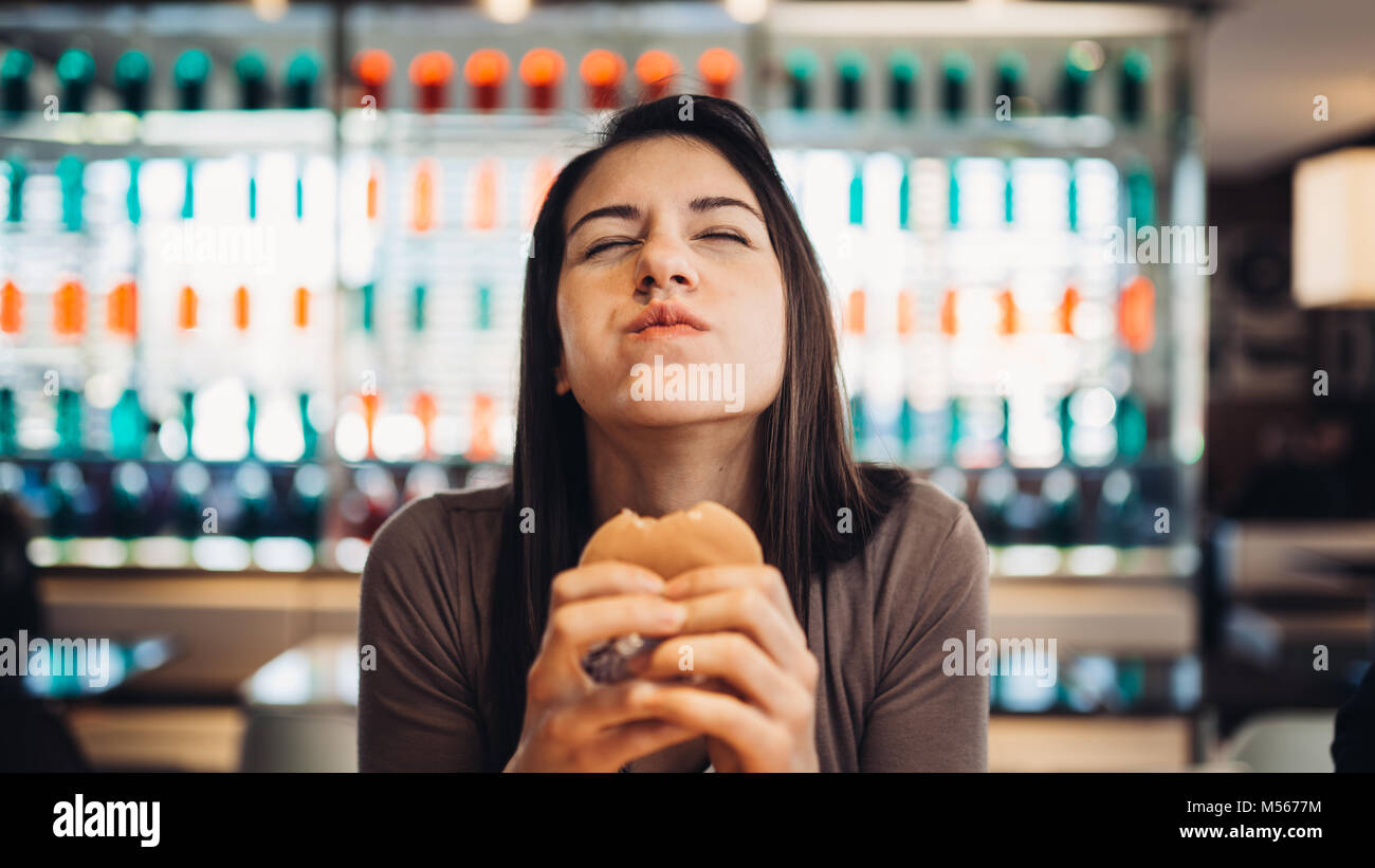 Woman guilty food hi-res stock photography and images - Alamy