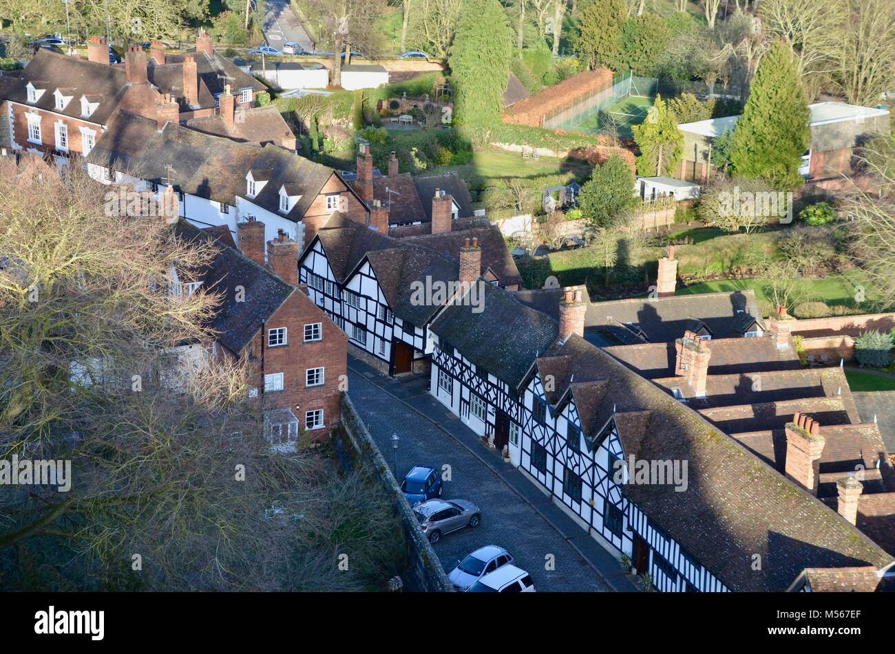 a street of tudor houses in the shadow of warwick castle Stock Photo ...