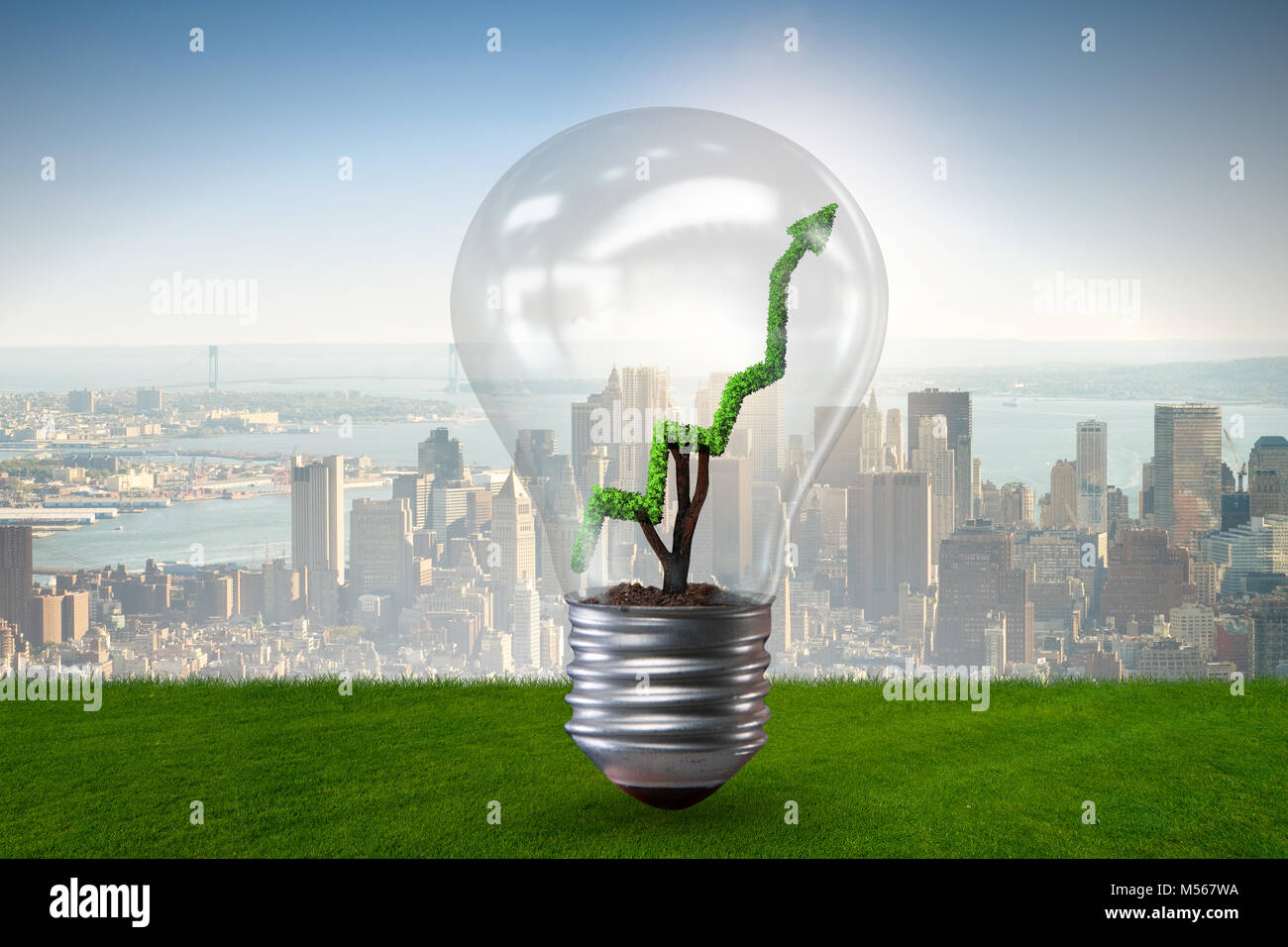 Green energy concept with green line graph in light bulb Stock Photo ...