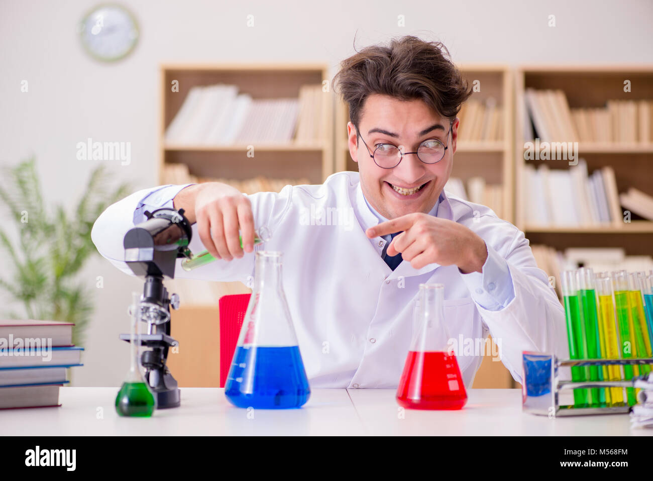 Lab experiment demonstrating chemical reaction hi-res stock photography ...