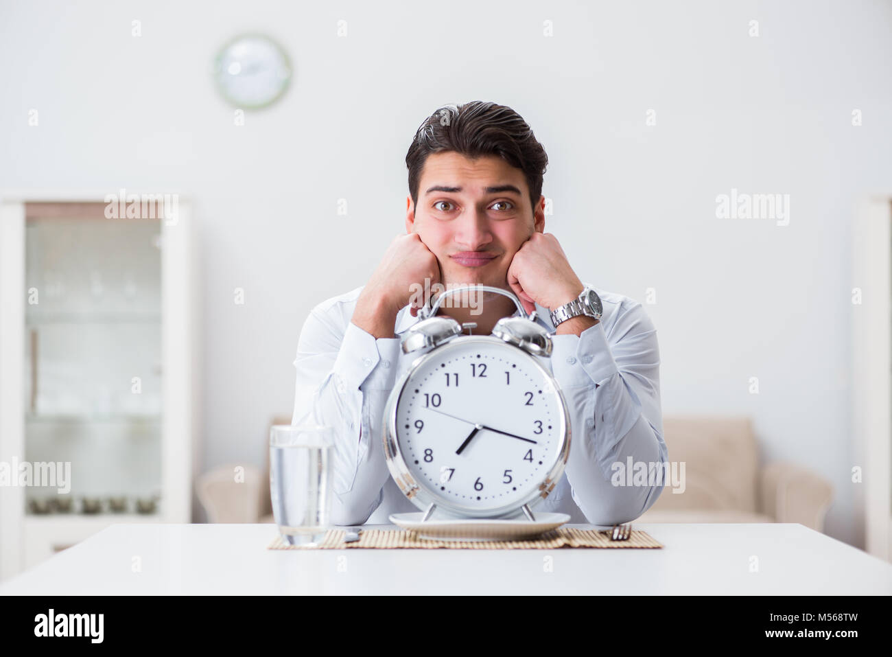Angry man waiting food in hi-res stock photography and images - Alamy