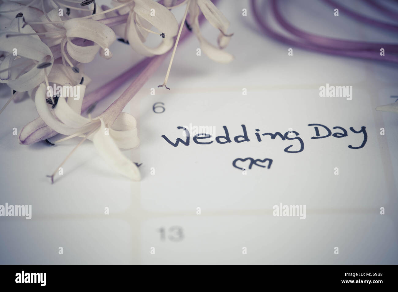 Reminder Wedding day in calendar planning and fountain Stock Photo - Alamy
